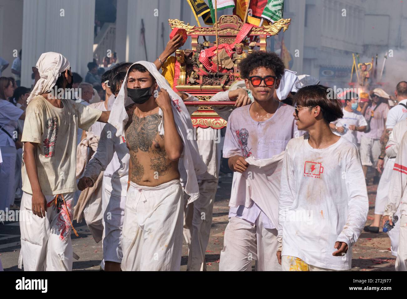 Palanquin bearers in a procession during the Vegetarian Festival (Nine ...