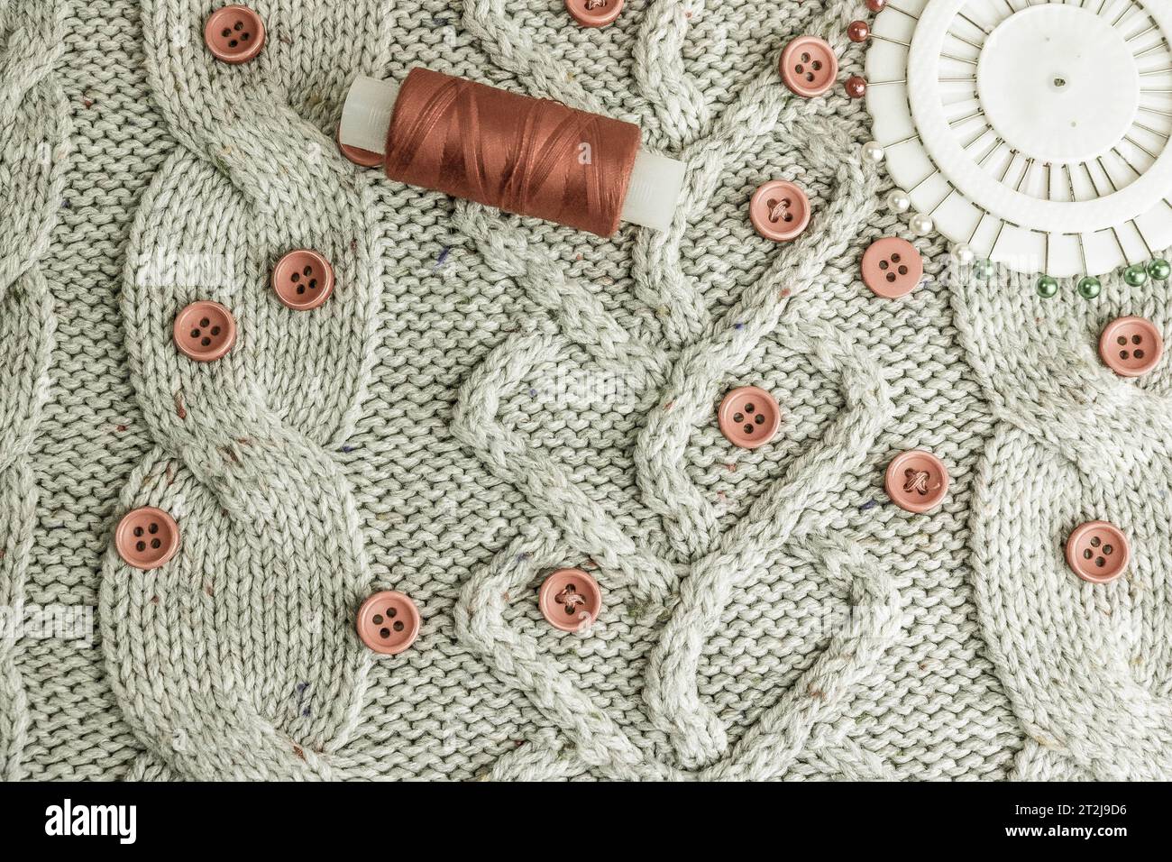 Beautiful texture of a soft warm natural sweater, knitted fabrics and ...