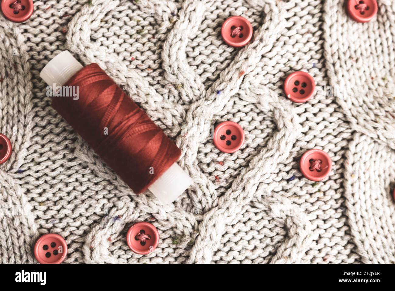 Beautiful texture of a soft warm natural sweater, fabrics with a ...