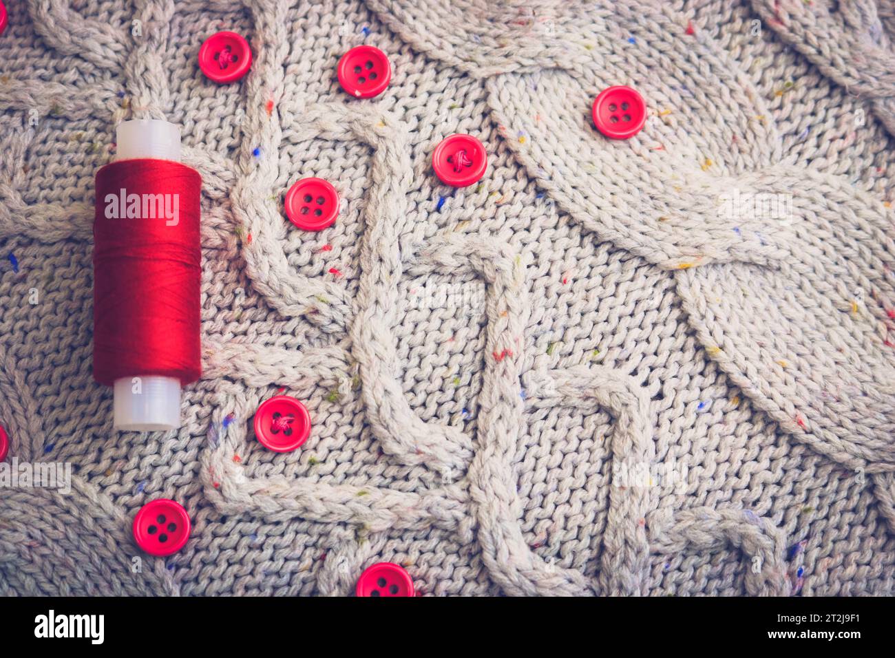 Beautiful texture of a soft warm natural sweater, fabrics with a ...