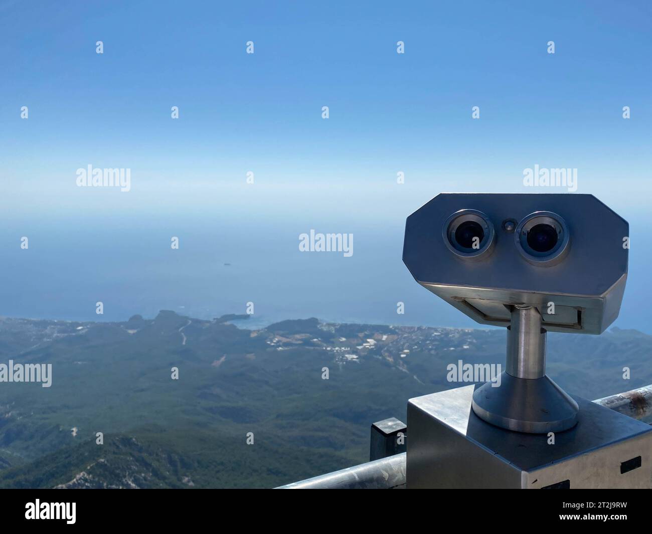 Binoculars telescope on observation deck for tourist in Lindau. Coin ...