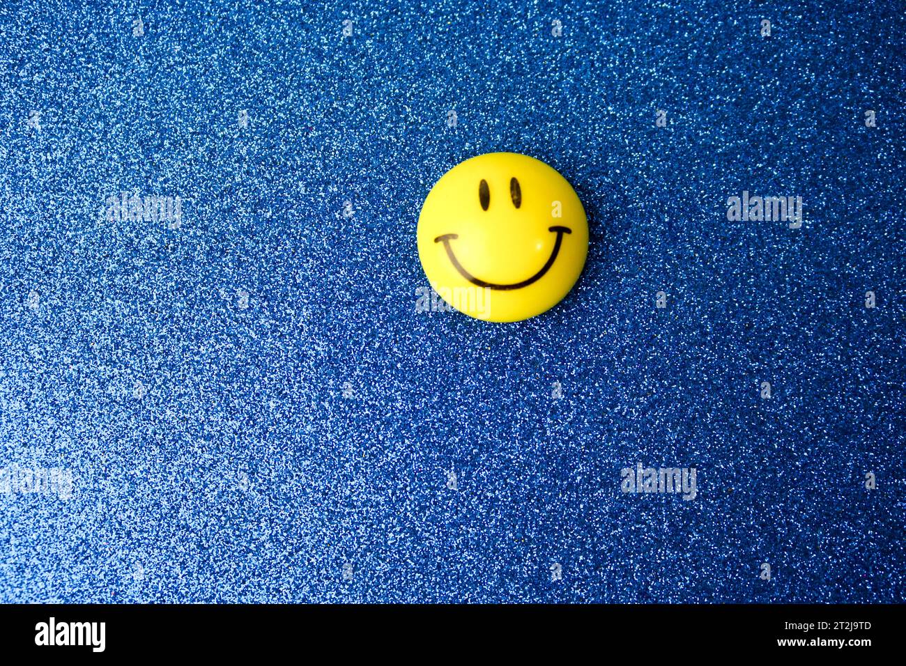 Round plastic yellow joyful smiling smiling toy round face Emoji on a ...