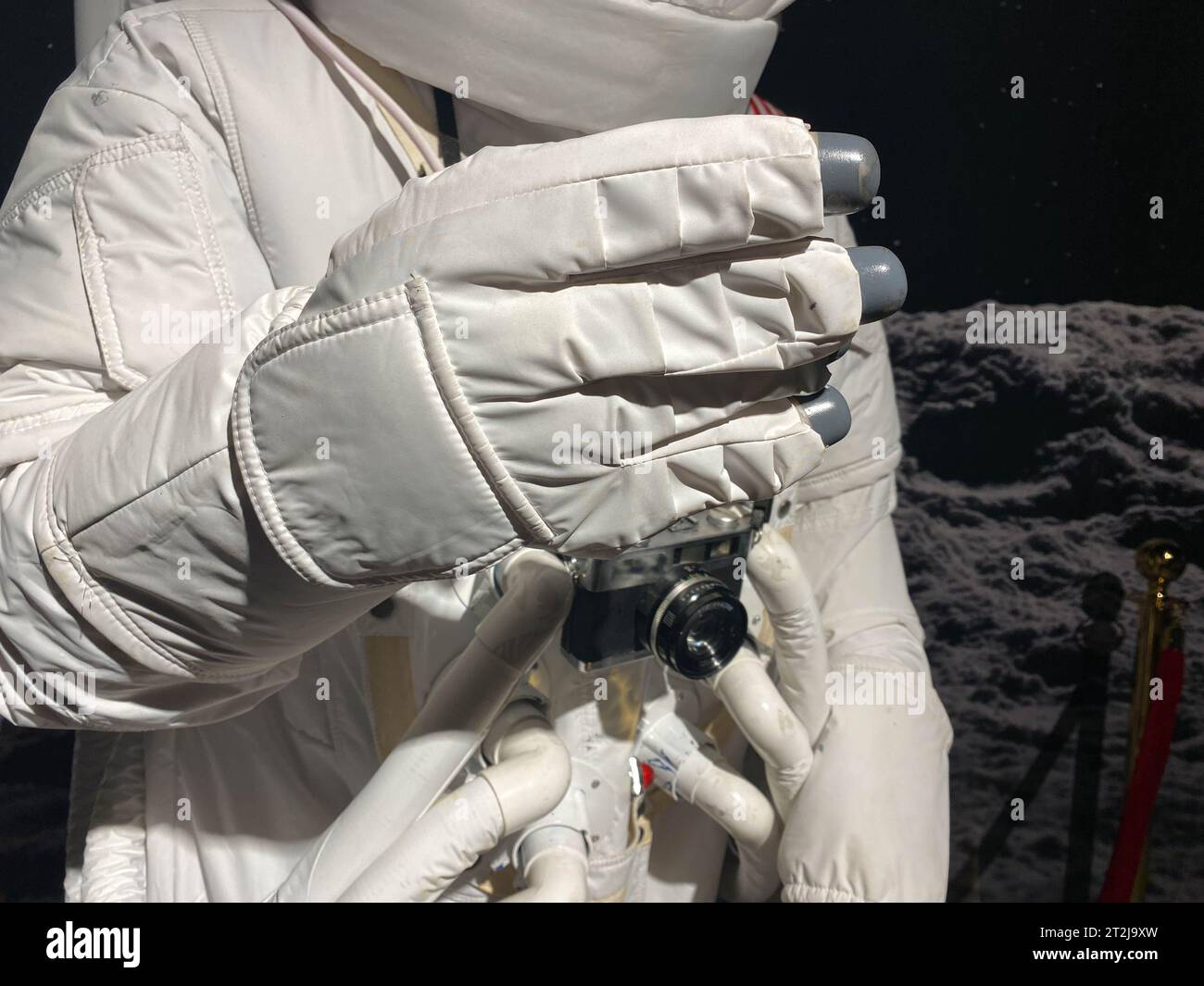 Astronaut with camera and far planet. Space mission. The elements of ...