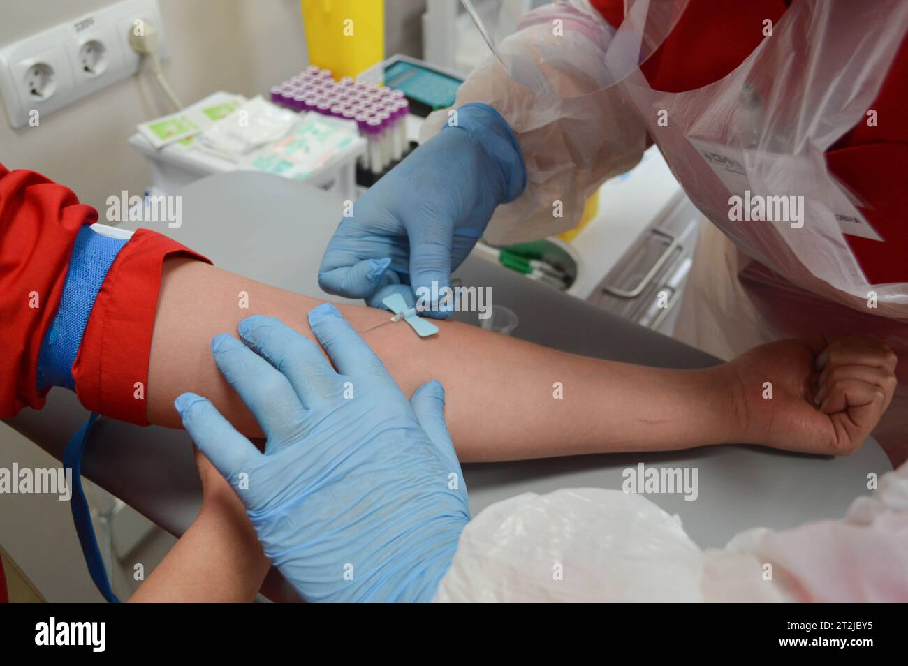 General practitioner doing blood test Stock Photo - Alamy