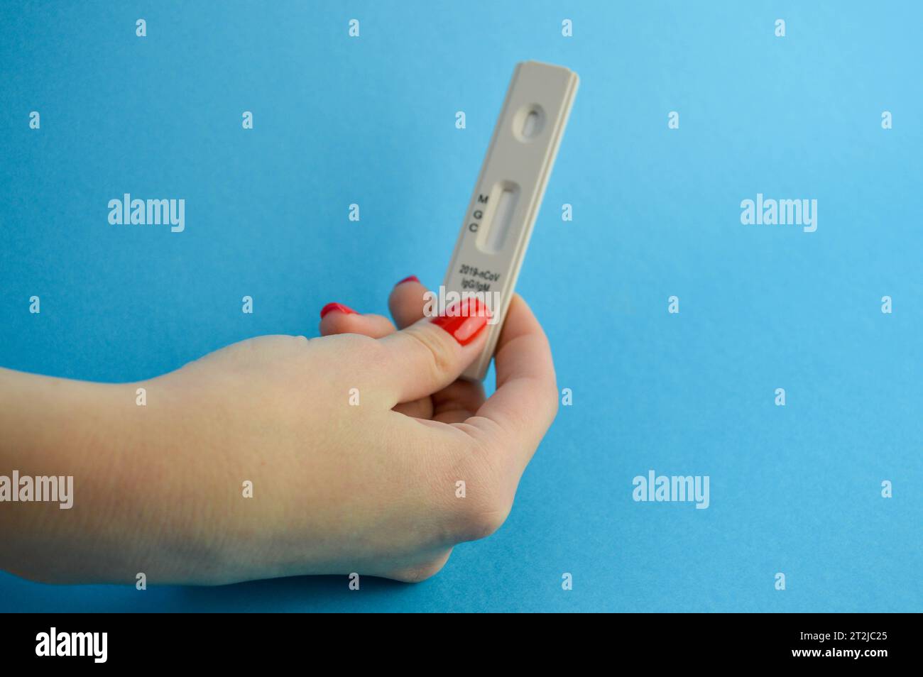 testing for antibodies. a blood test to determine the coronavirus. girl ...
