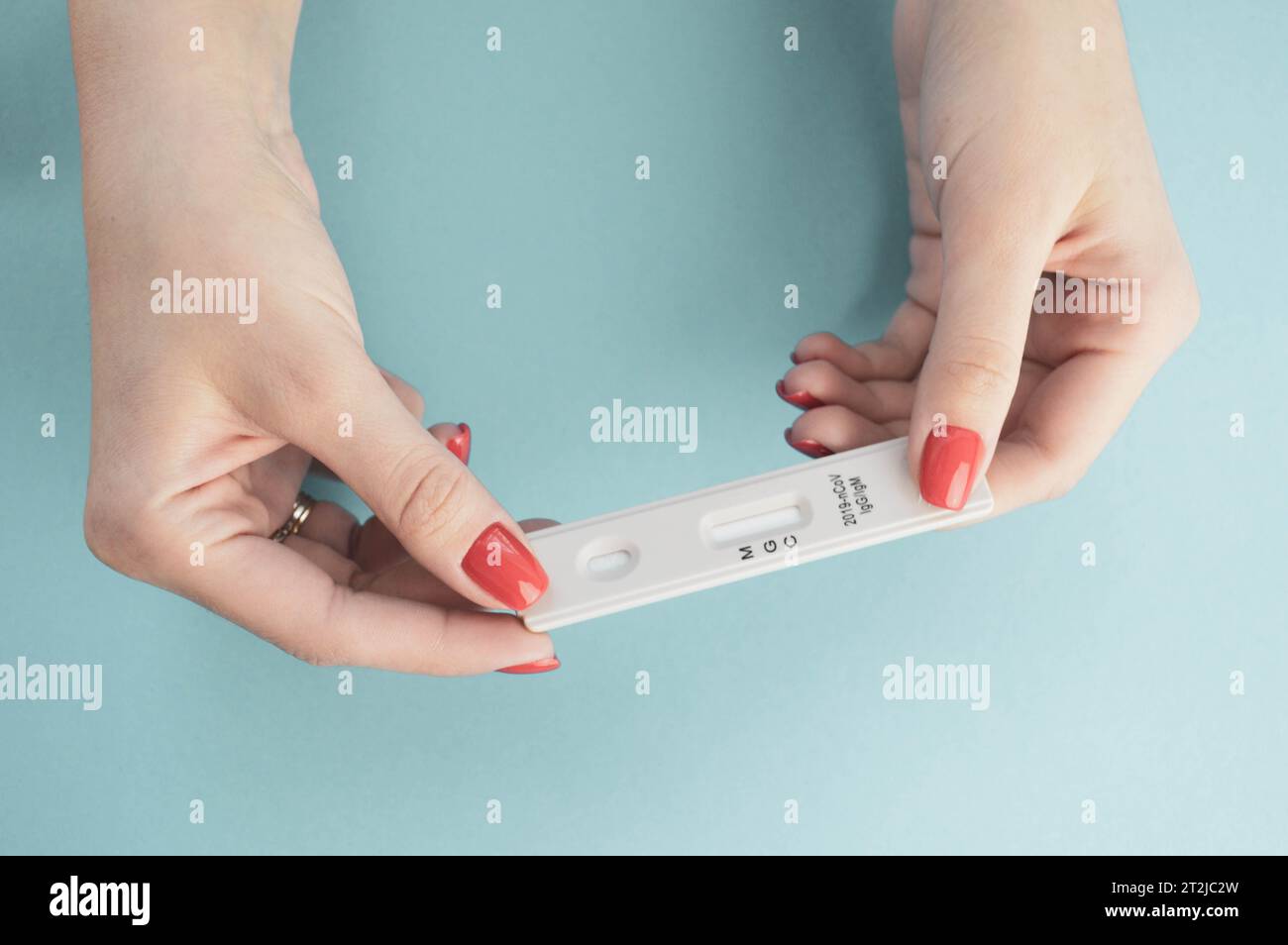 Healthcare professional holding Coronavirus COVID-19 rapid diagnostic ...