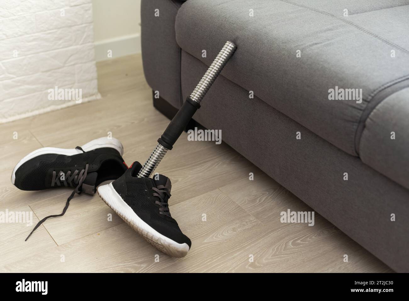 High angle background of disassembled prosthetic leg and foot on table ...
