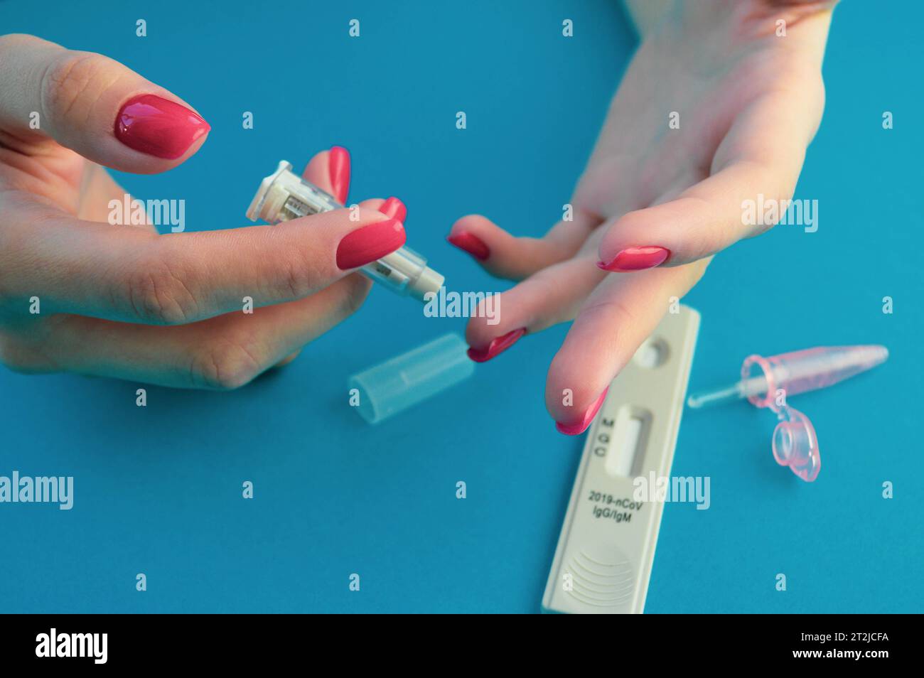 Healthcare professional holding Coronavirus COVID-19 rapid diagnostic ...