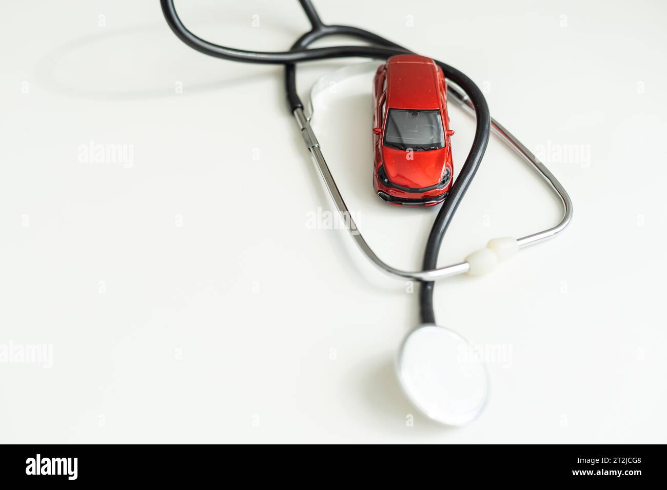 Car diagnostics, stethoscope and car on white background, concept of ...