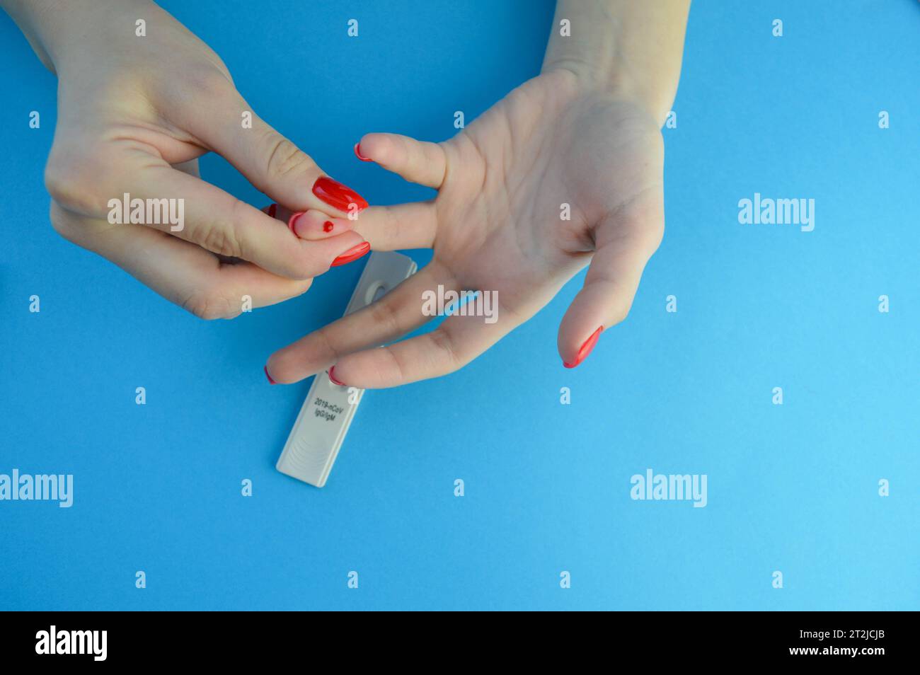 Positive test result by using rapid test for COVID-19, quick fast ...