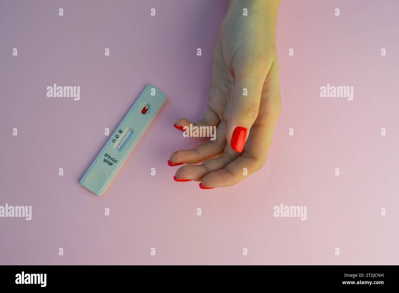 Scientist or doctor placing blood sample on Rapid Diagnostic Rest RDT ...