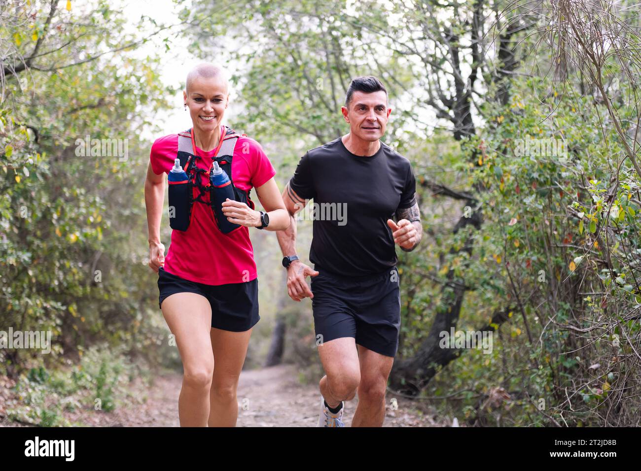 Male athlete running in woods hi-res stock photography and images - Alamy