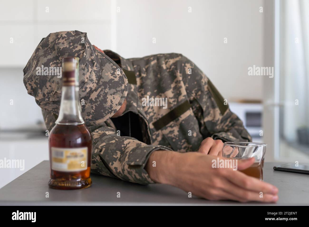 young attractive wasted and depressed addict and alcoholic man with ...