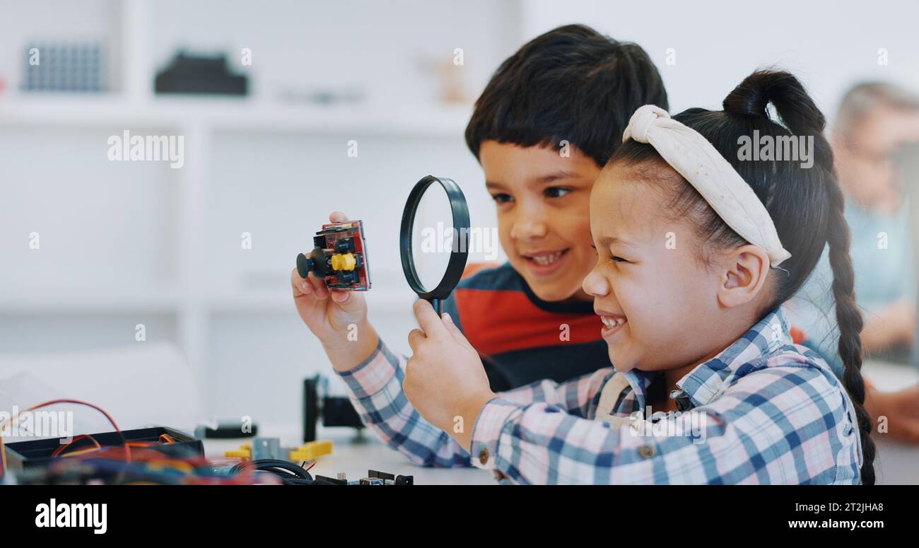 Children, magnifying glass and school for robotics, teamwork and ...