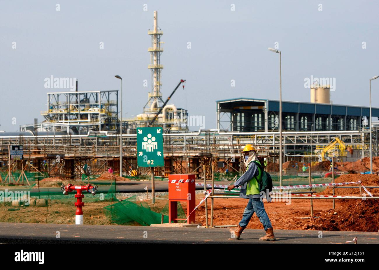 FILE - A worker walks at the construction site of a Lynas rare earths ...