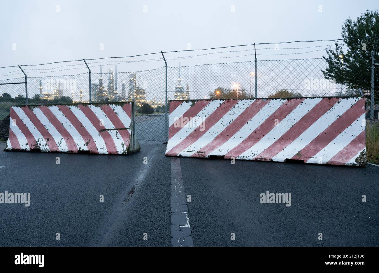 Leuna, Germany. 20th Oct, 2023. Two concrete barriers stand on a road ...