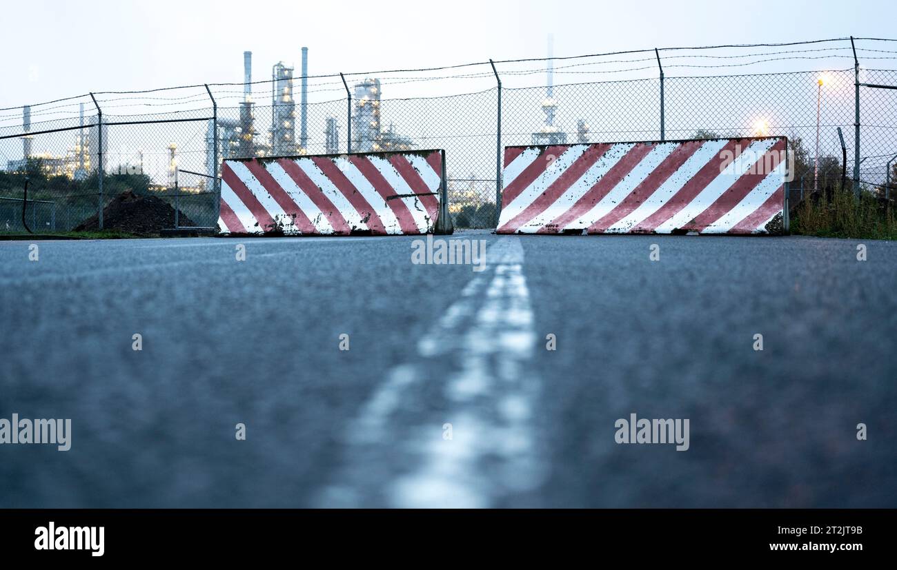 Leuna, Germany. 20th Oct, 2023. Two concrete barriers stand on a road ...