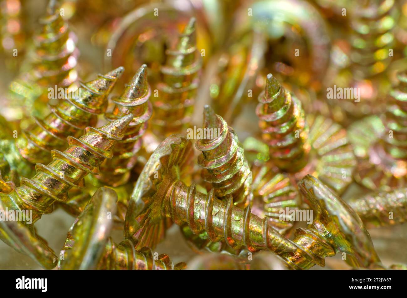 Random pile of galvanized screws, abstract industrial background Stock ...