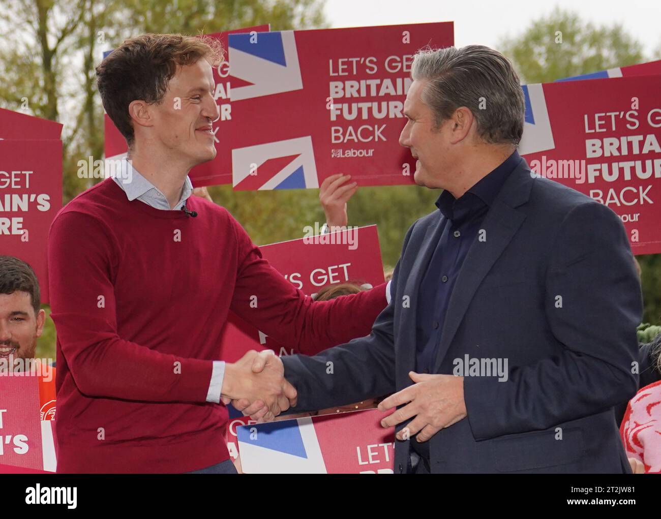 Newly elected Labour MP Alistair Strathern (centre) is congratulated by ...