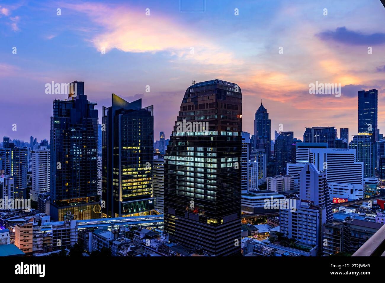 Bangkok skyline at sunset, high rise buildings on lower Sukhumvit ...