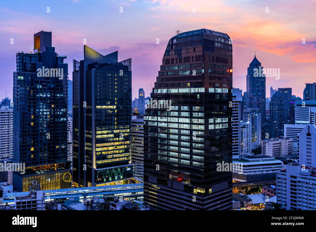 Bangkok skyline at sunset, high rise buildings on lower Sukhumvit ...