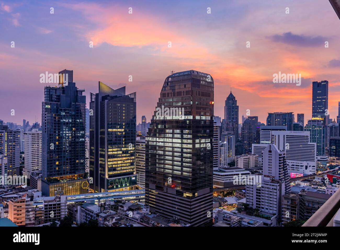 Bangkok skyline at sunset, high rise buildings on lower Sukhumvit, Thailand Stock Photo - Alamy