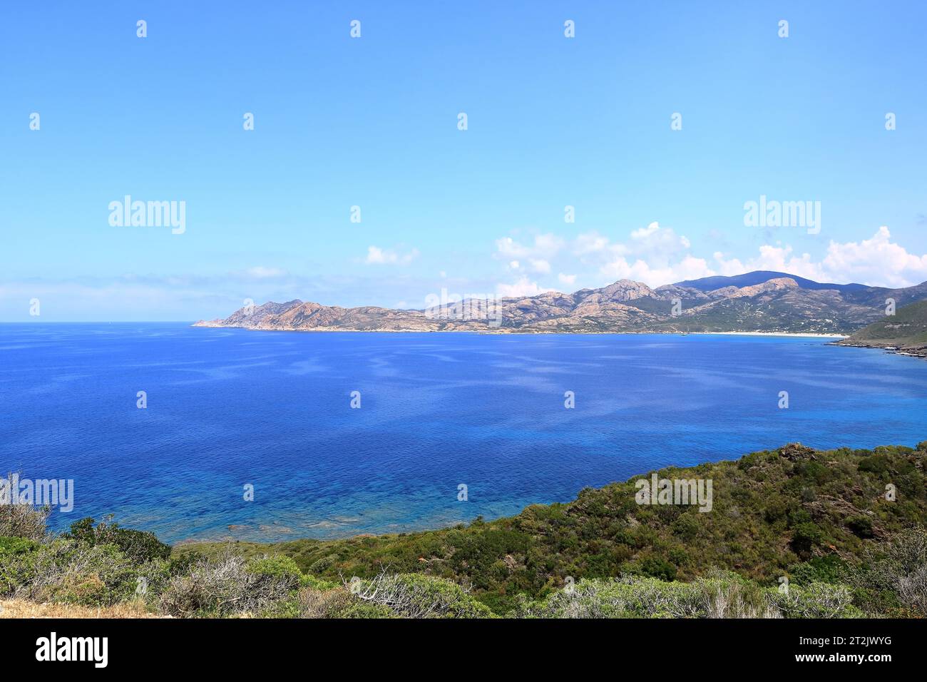 Orange and yellow lichen at bizarre rock formations at Lozari beach in ...
