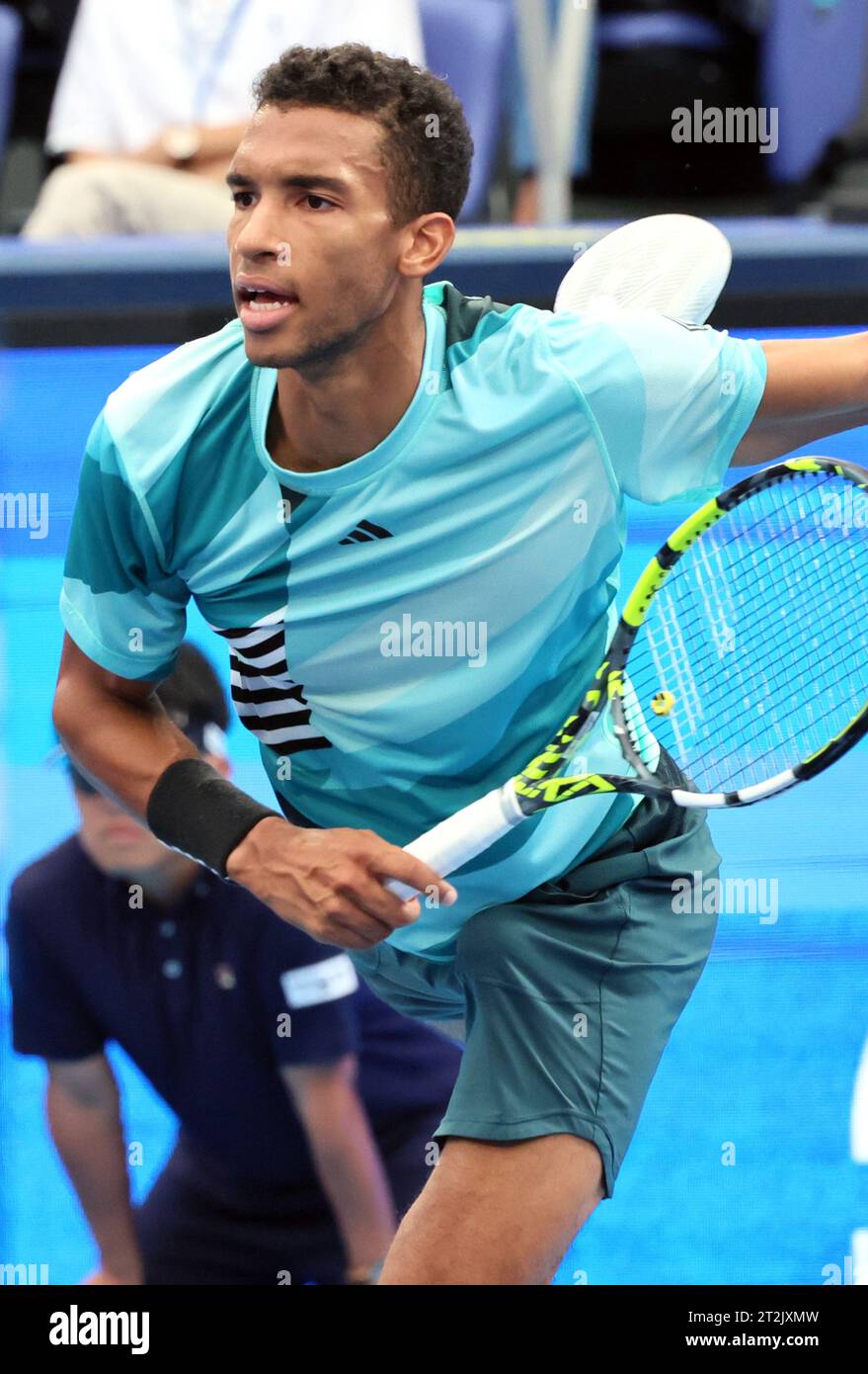 Tokyo, Japan. 20th Oct, 2023. Felix Auger-Aliassime of Canada delivers a service against Marcos ...
