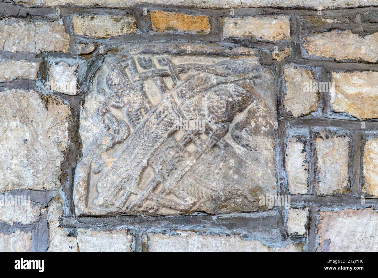 Carved stone Saxon relic from ancient christian Cross, church of Saint ...