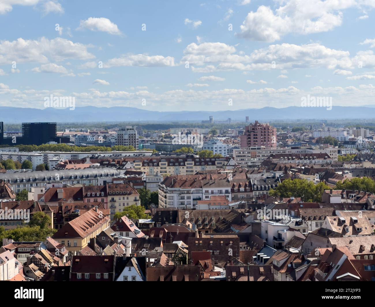 Strasbourg Center: Timbered Alsatian houses and tall buildings frame ...