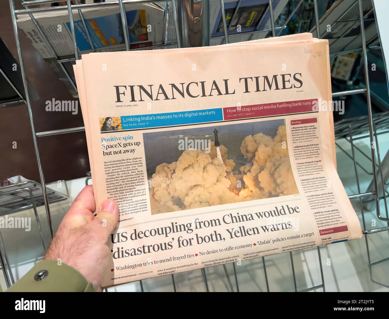 London, United Kingdom - 21 Apr 2023: male hand grasps the latest ...