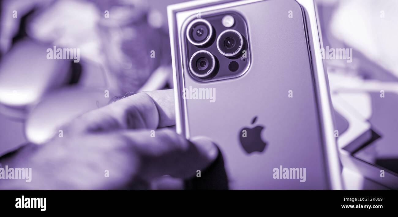 London, UK - Sep 28, 2023: hand unveils the new Apple Computers iPhone ...