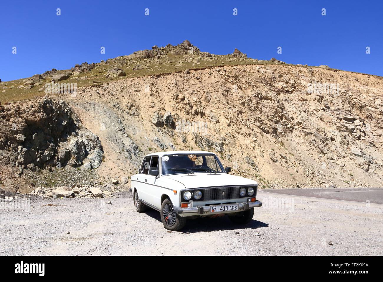 August 20 2023 - Too-Ashuu pass near Bishkek in Kyrgyzstan, Central Asia: people and cars cross ...