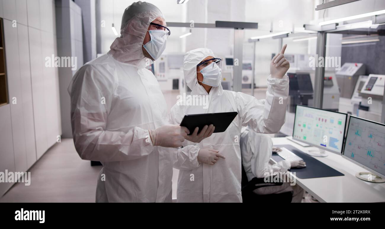 Factory Clean Room Laboratory. Industrial Engineer Using Technology ...