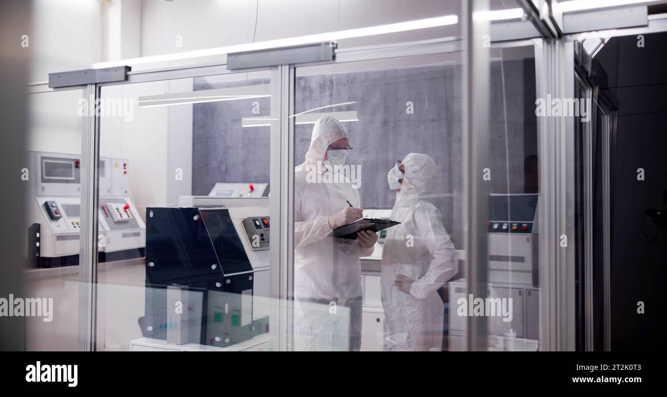 Factory Clean Room Laboratory. Industrial Engineer Using Technology ...