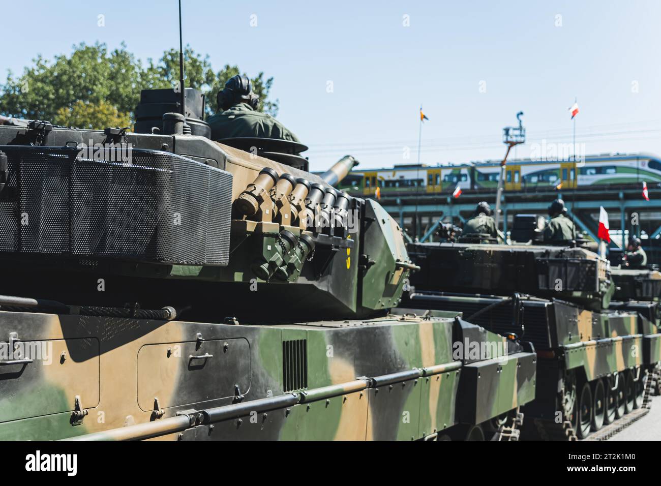 Convoy of military battle tanks on the streets of european capital city ...
