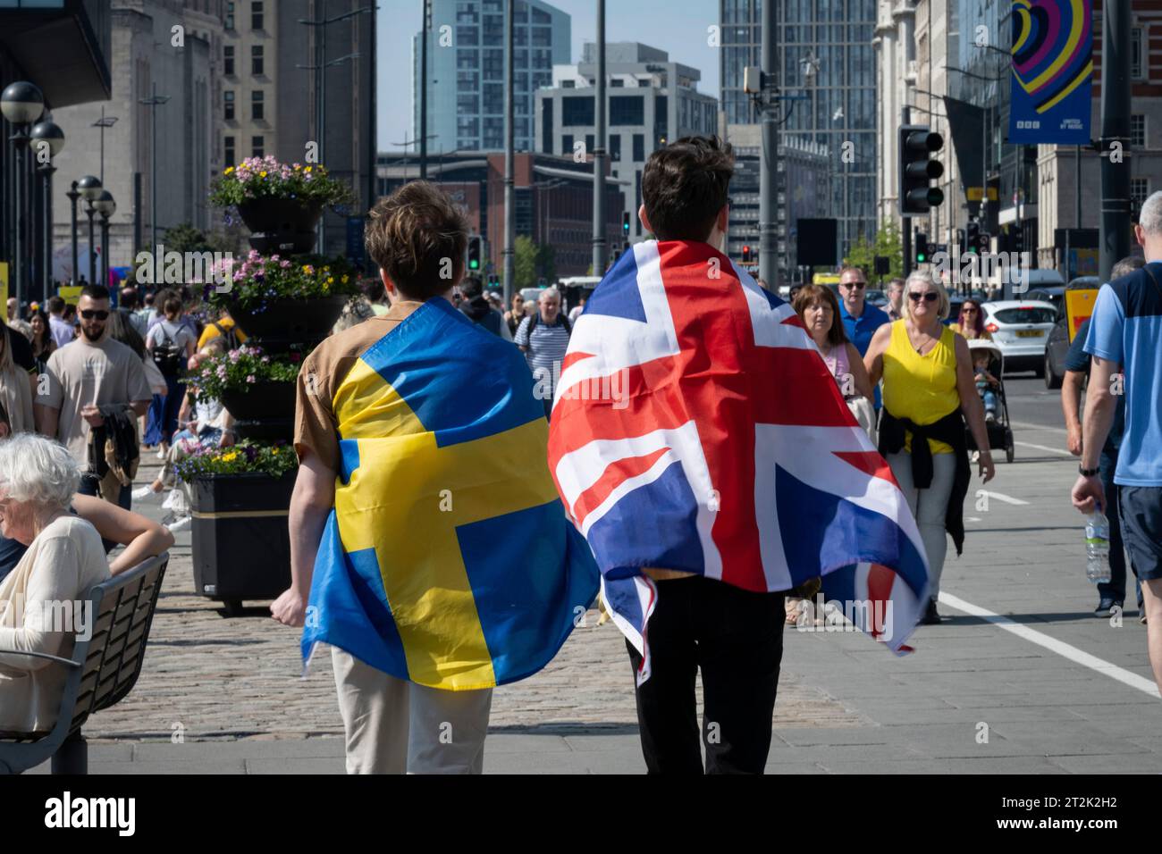 Visitors to Eurovision wearing Flags, Liverpool, May 2023 Stock Photo ...