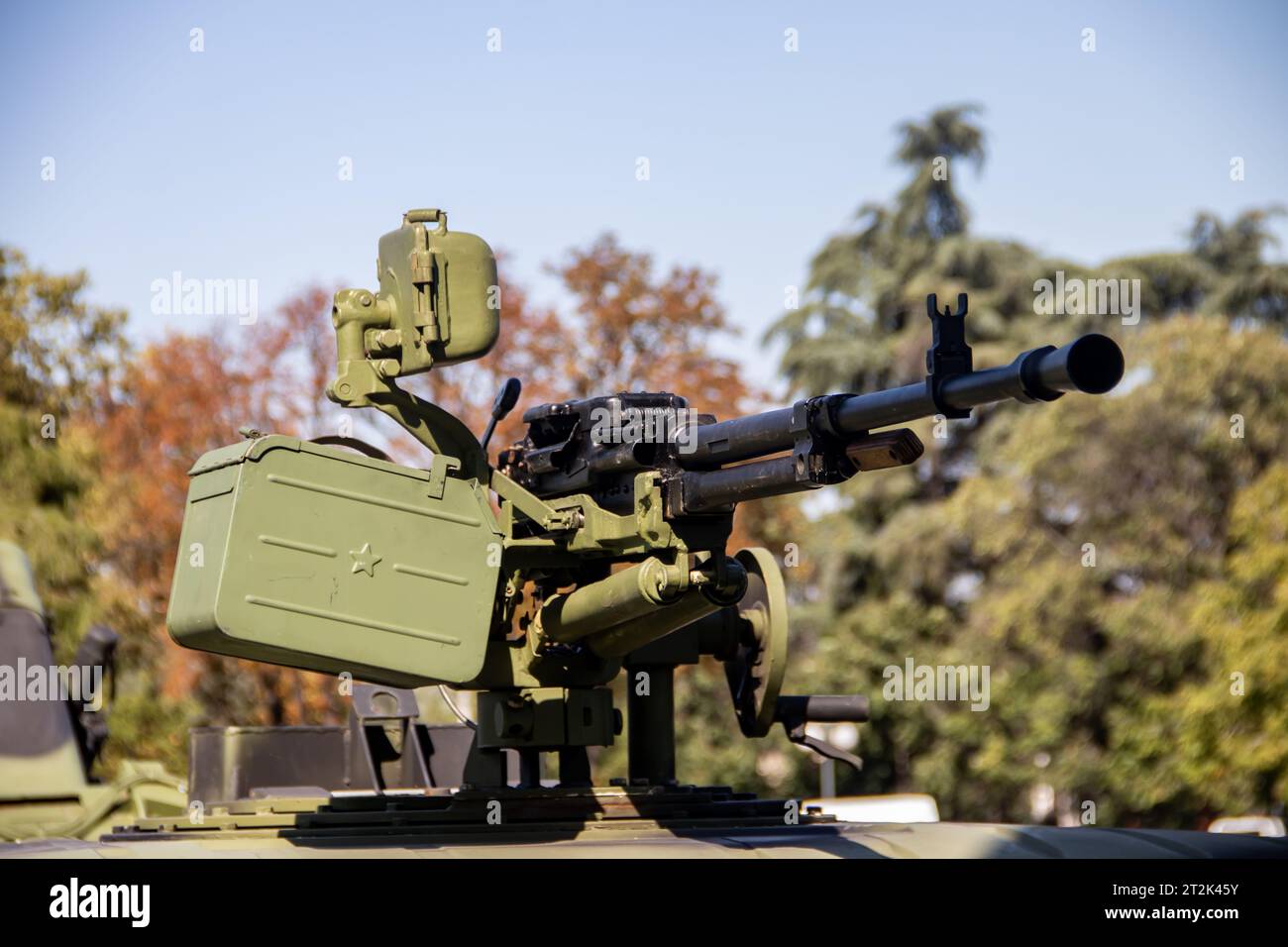 Armored combat vehicle painted in camouflage colors, armed with lethal ...