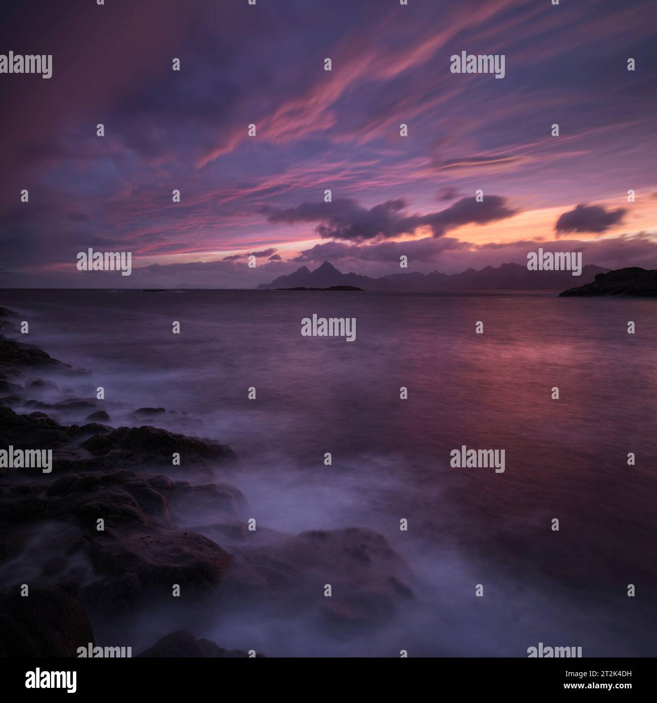 Coloful sunset from the Island of Skrova with Lofoten Islands in the ...