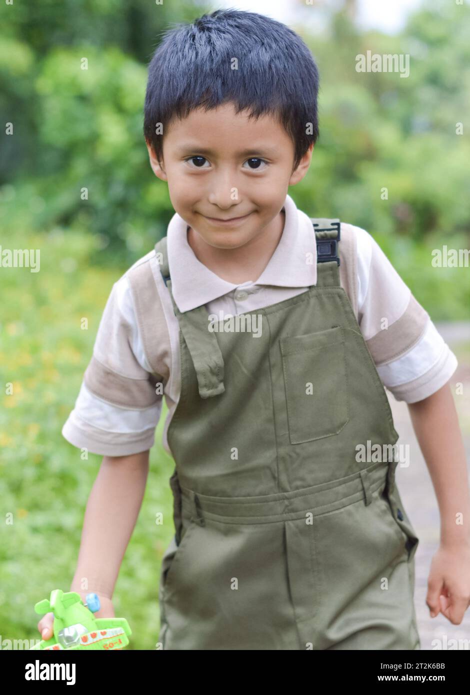 Happy Latin boy playing in a forest in the mountains of Puebla Stock ...