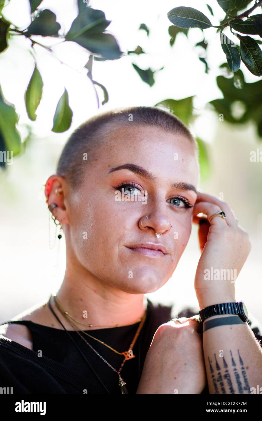 Portrait of Non Binary Person with Shaved Head in San Diego Stock Photo ...