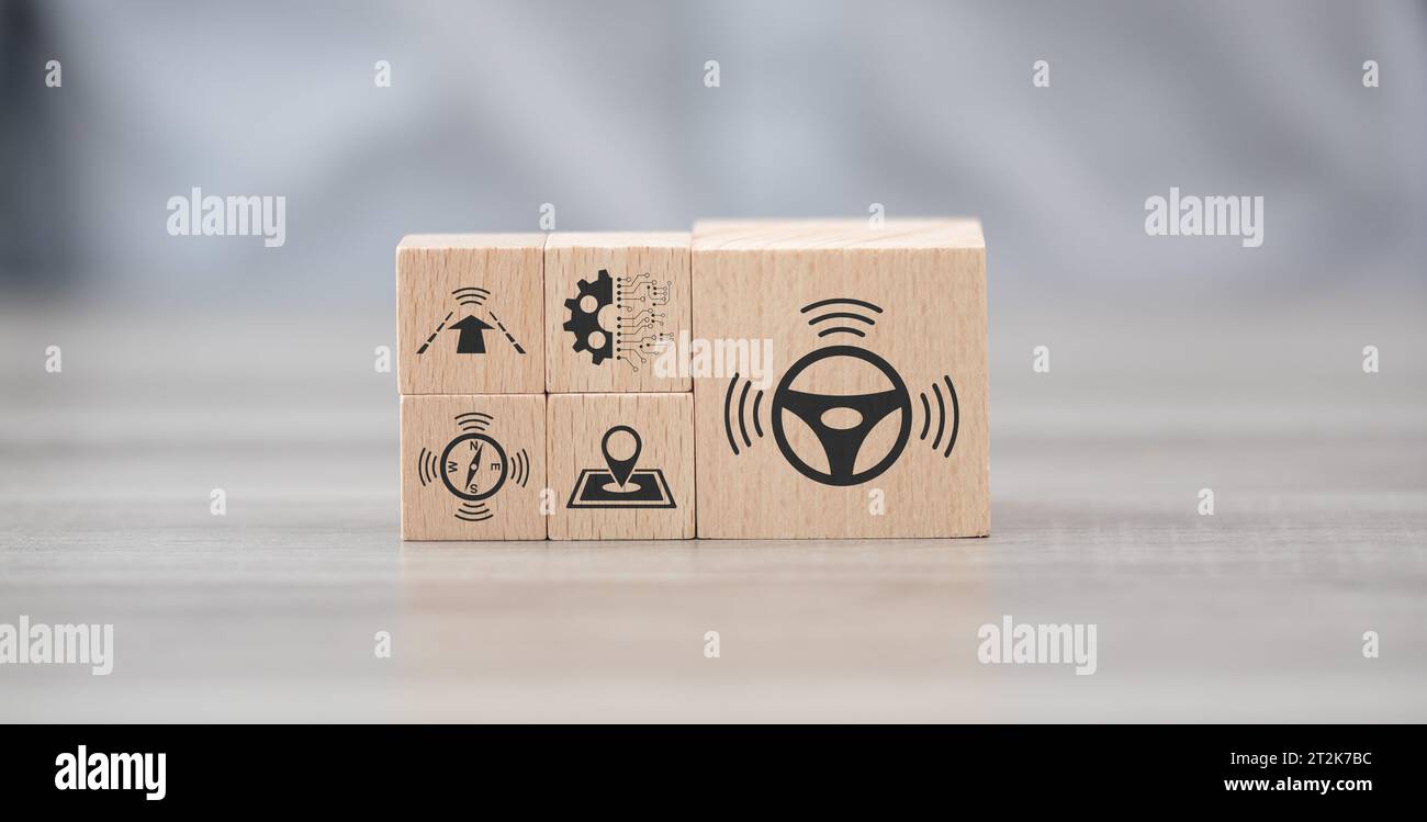 Wooden blocks with symbol of self-driving car concept Stock Photo - Alamy