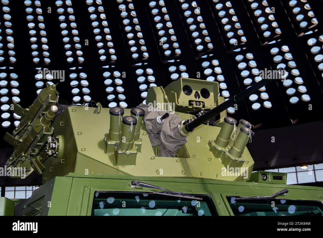 Armored combat vehicle painted in camouflage colors, armed with lethal ...