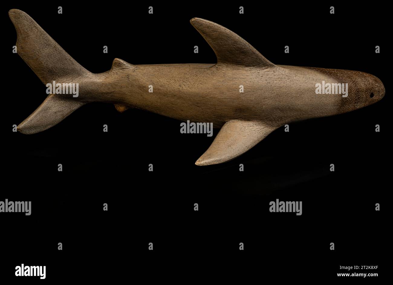 wood shark on black background Stock Photo - Alamy