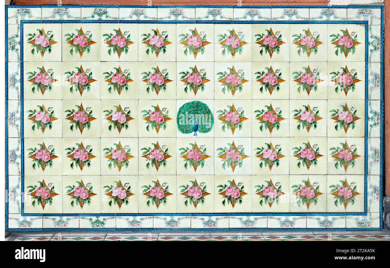 Rows of antique Nyonya Tiles with red roses. Traditional Peranakan ...