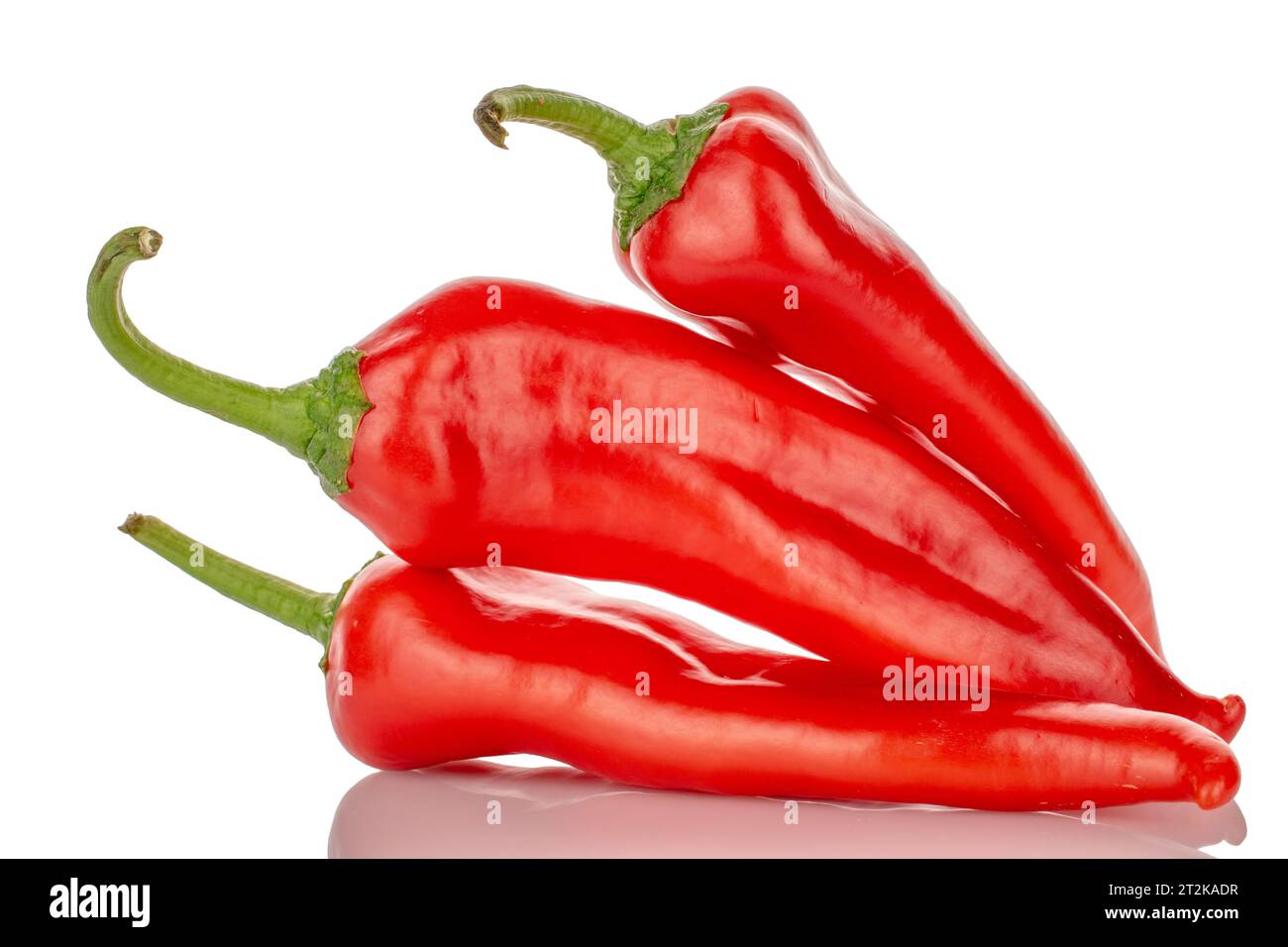 Three sweet red peppers, macro, isolated on white background Stock ...