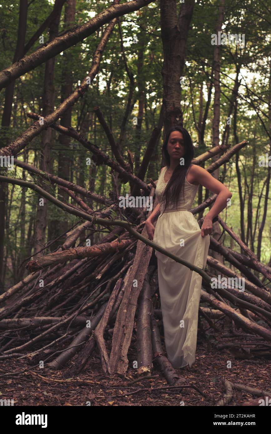 Lonely woman in white dress in the forest, bride, witchcraft, magical ...