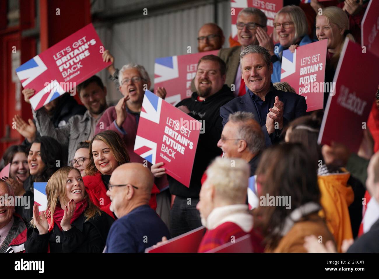 Newly elected Labour MP Sarah Edwards (bottom left) looks up at party ...