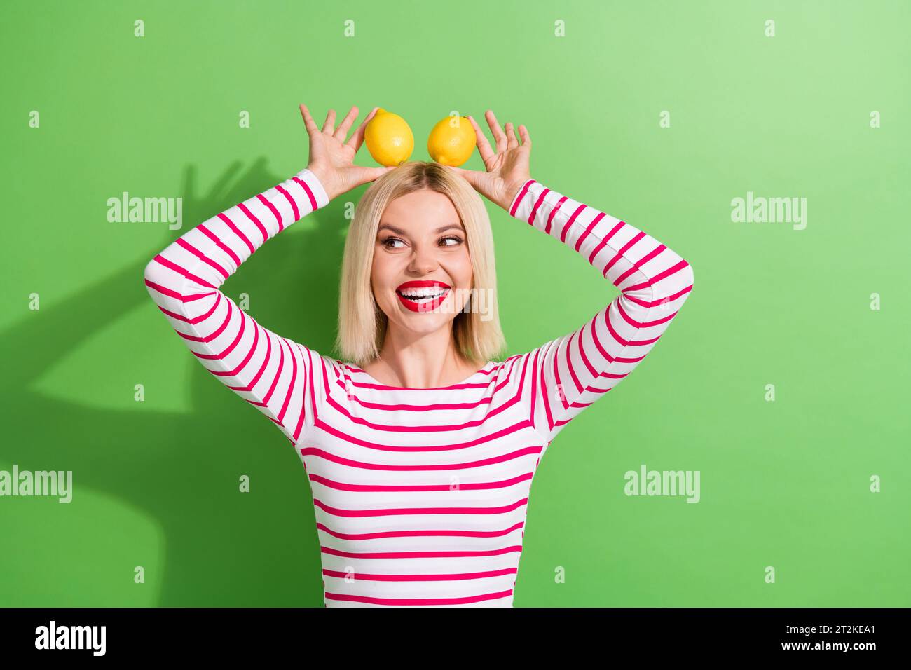 Photo of young pretty nice girl flirty having fun hands head playful ...