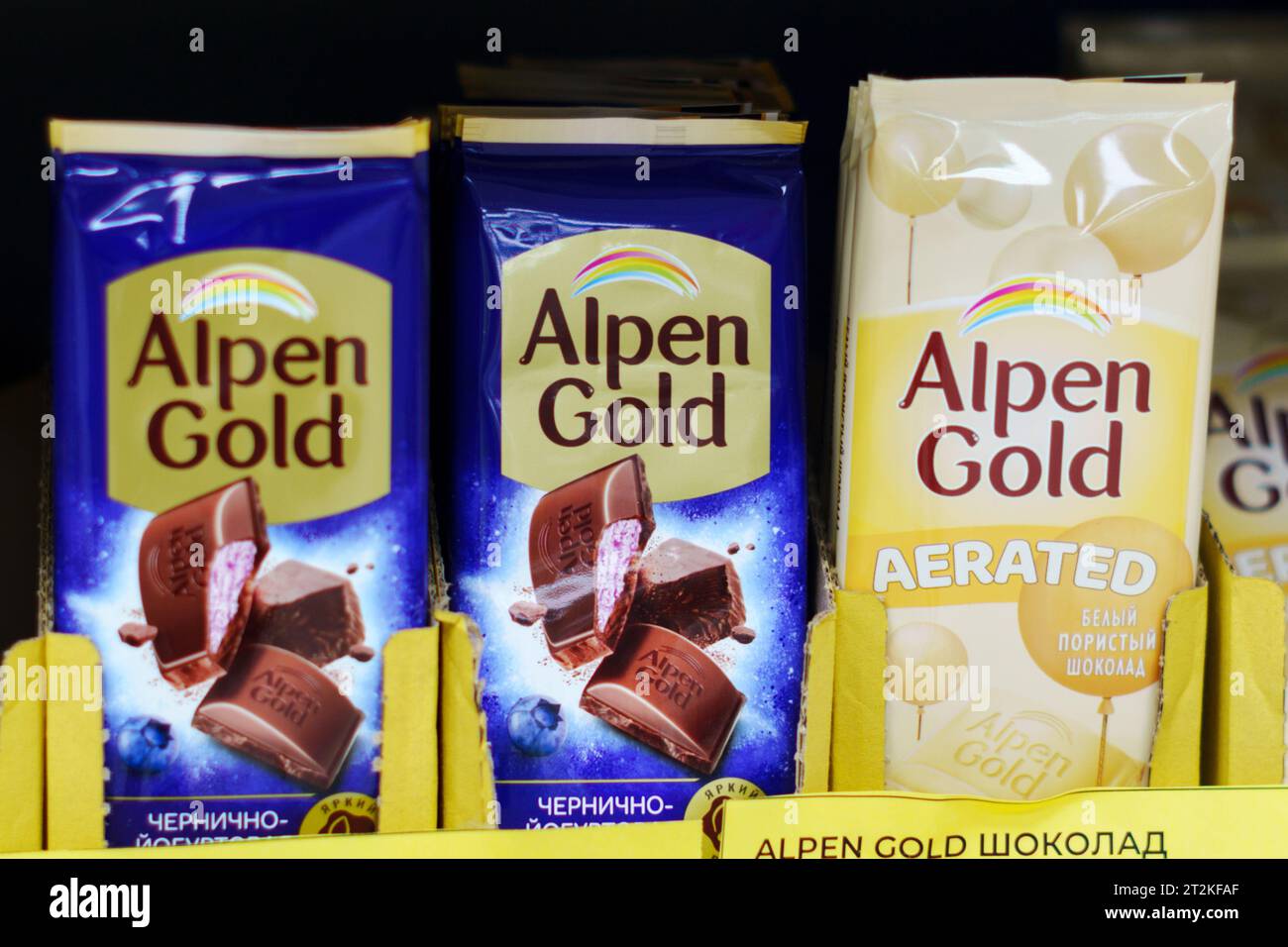 Tyumen, Russia-October 15, 2023: Different Alpen Gold chocolate, on the shelves of a hypermarket ...